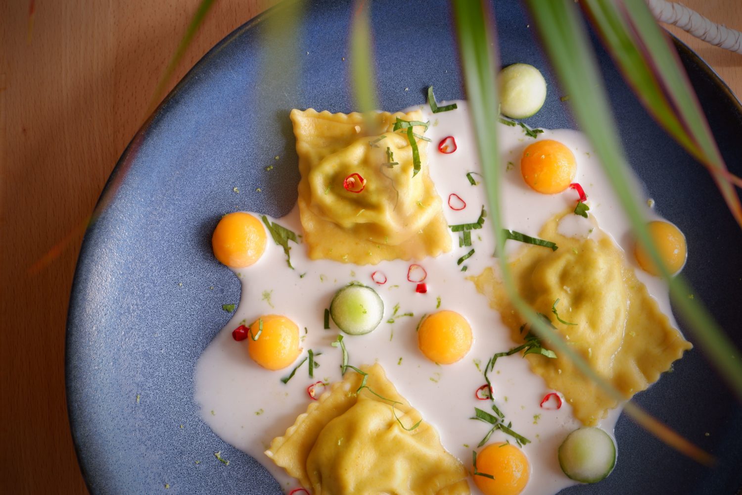 Summer avocado ravioli with papaya, coconut and tamarind